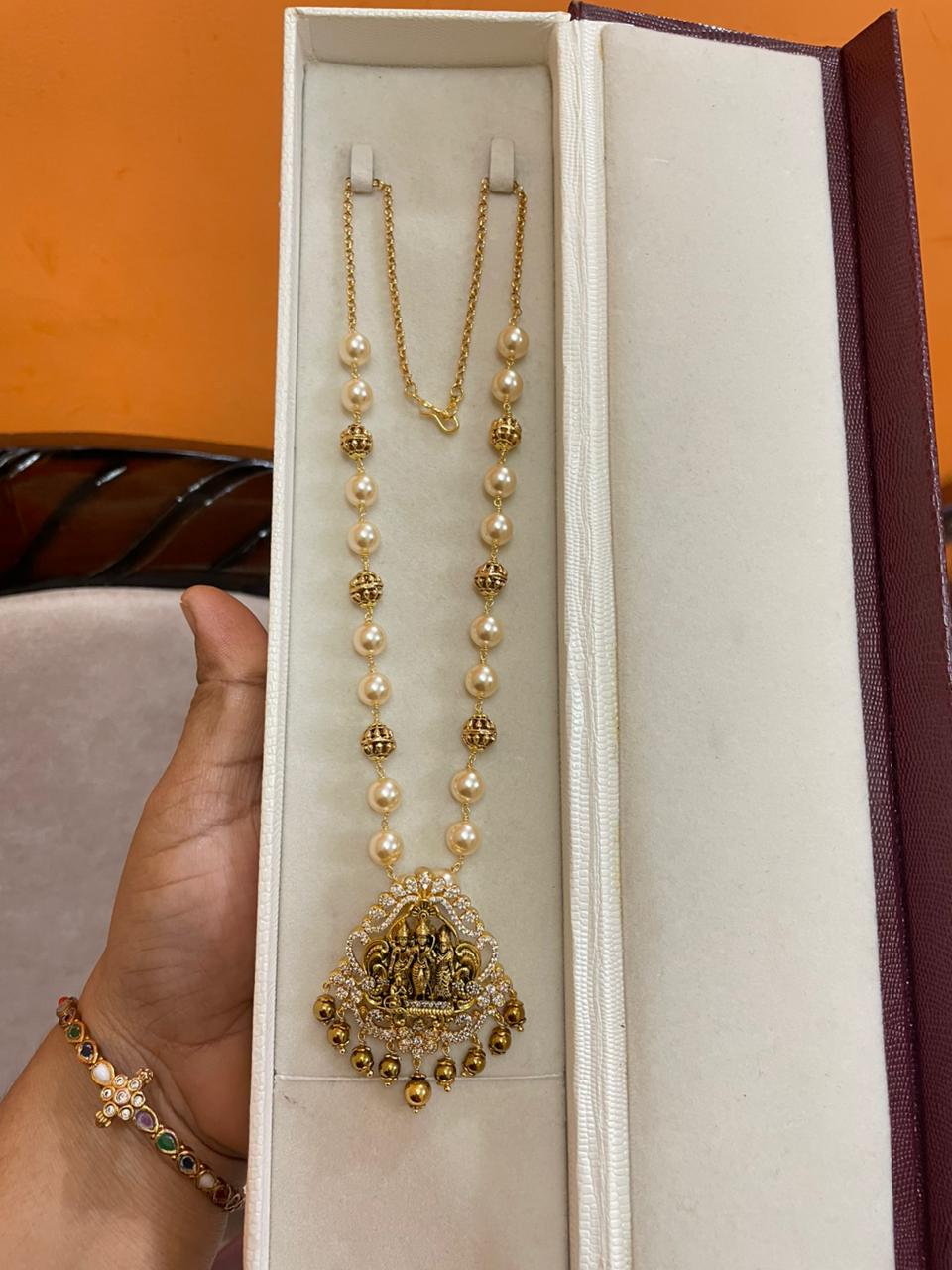 Nakshi locket with Swarovski pearls – Kankanam - South India Jewellery